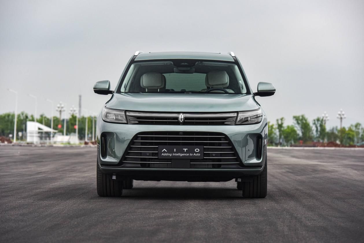 特斯拉刚举起降价的刀，却敌不过AITO问界的“回首掏”_搜狐汽车_搜狐网
