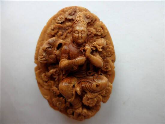 Shandong handicraft: Traditional fruit pit carving promoted in Weifang ...